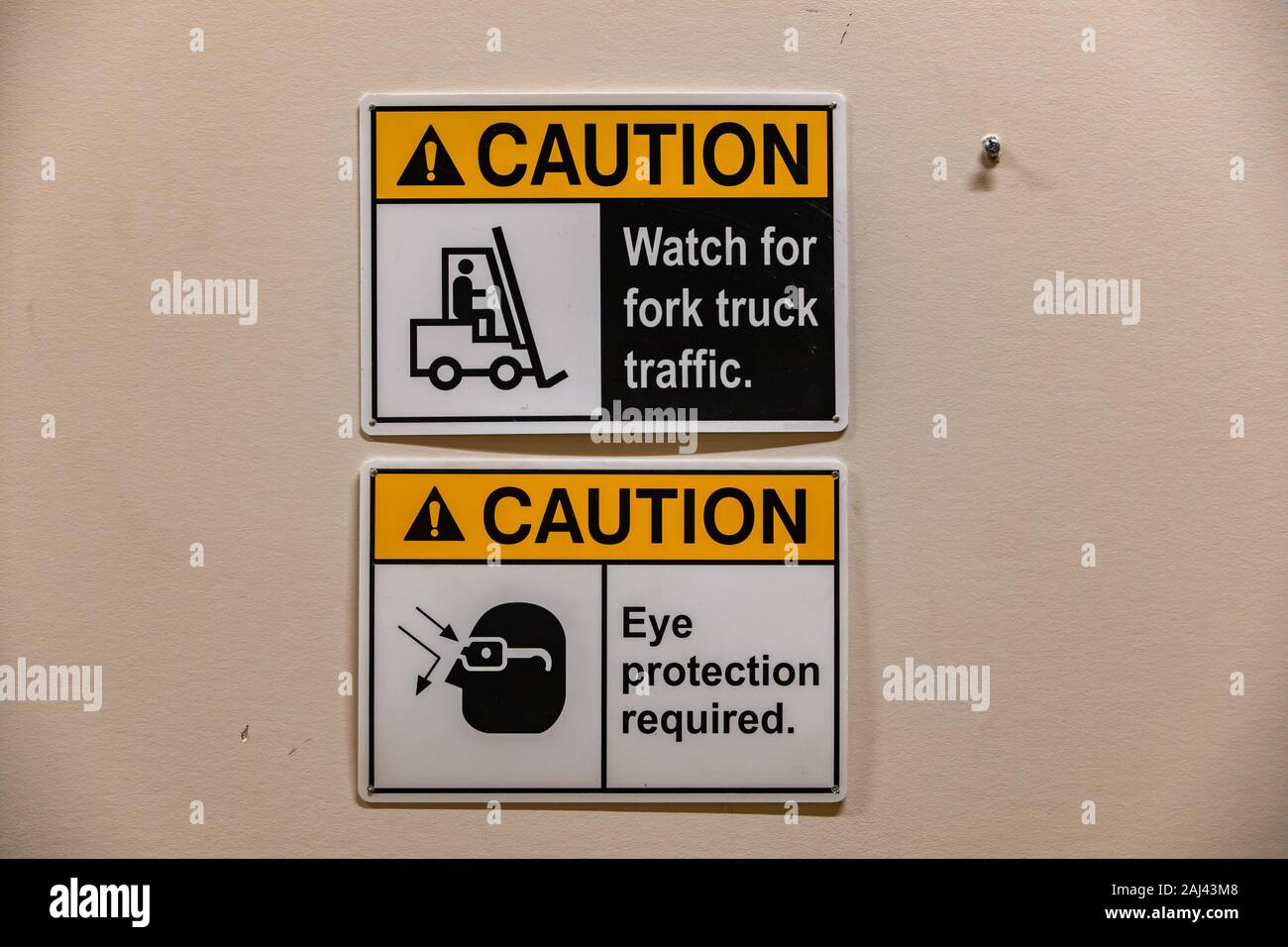 two caution signs, watch for fork truck traffic. eye protection ...
