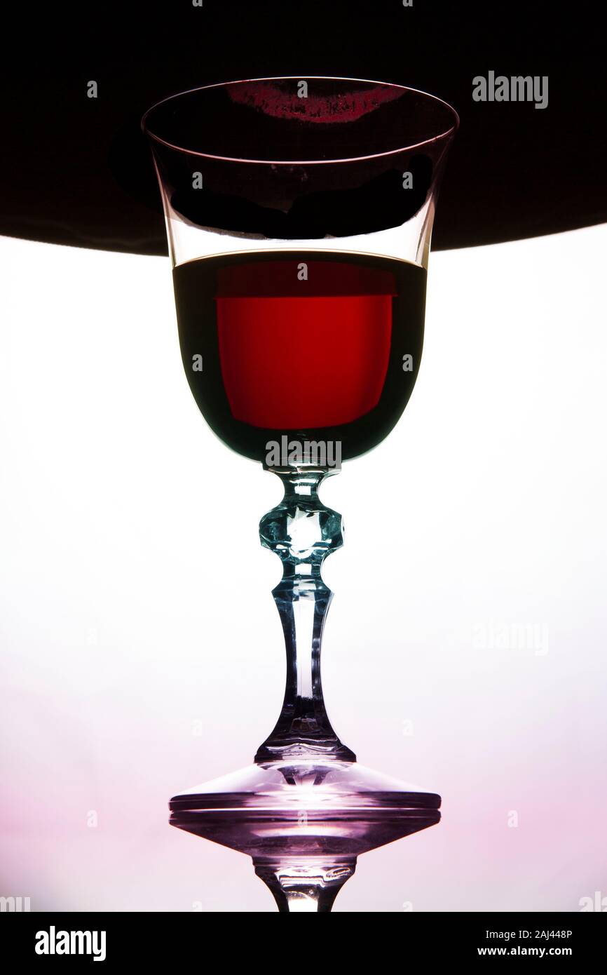 Glass with red wine, abstract image Stock Photo - Alamy