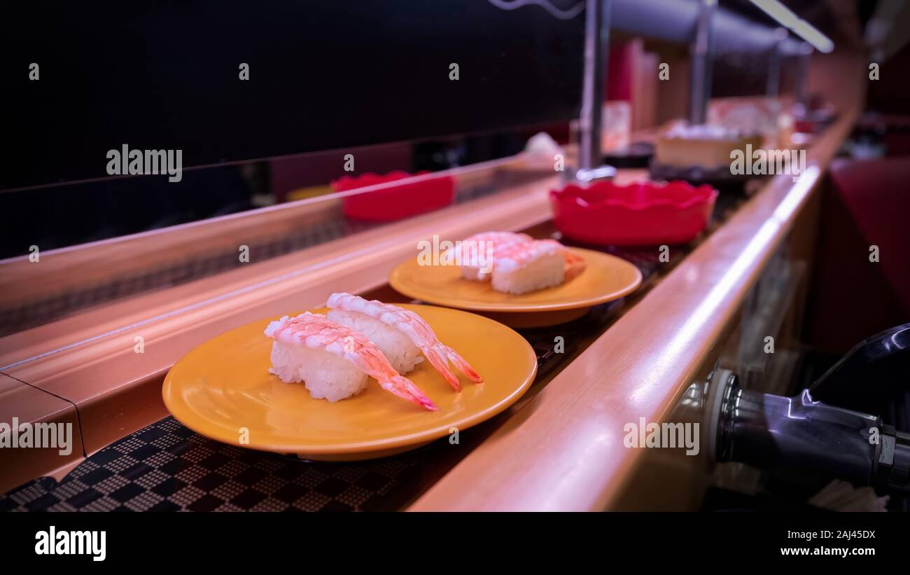 Moving sushi restaurant hi-res stock photography and images - Alamy