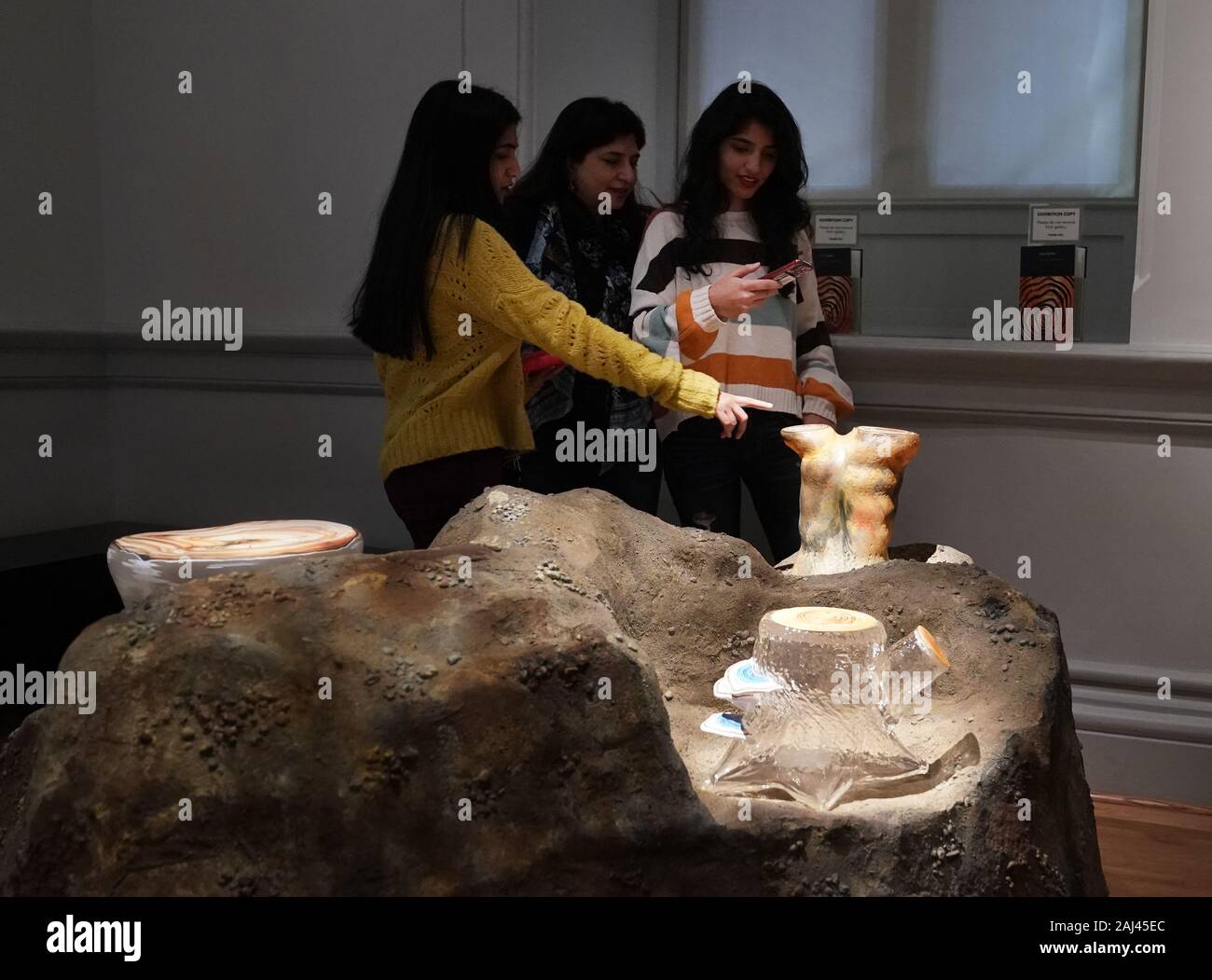 Washington, USA. 2nd Jan, 2020. Visitors view artworks during the ...
