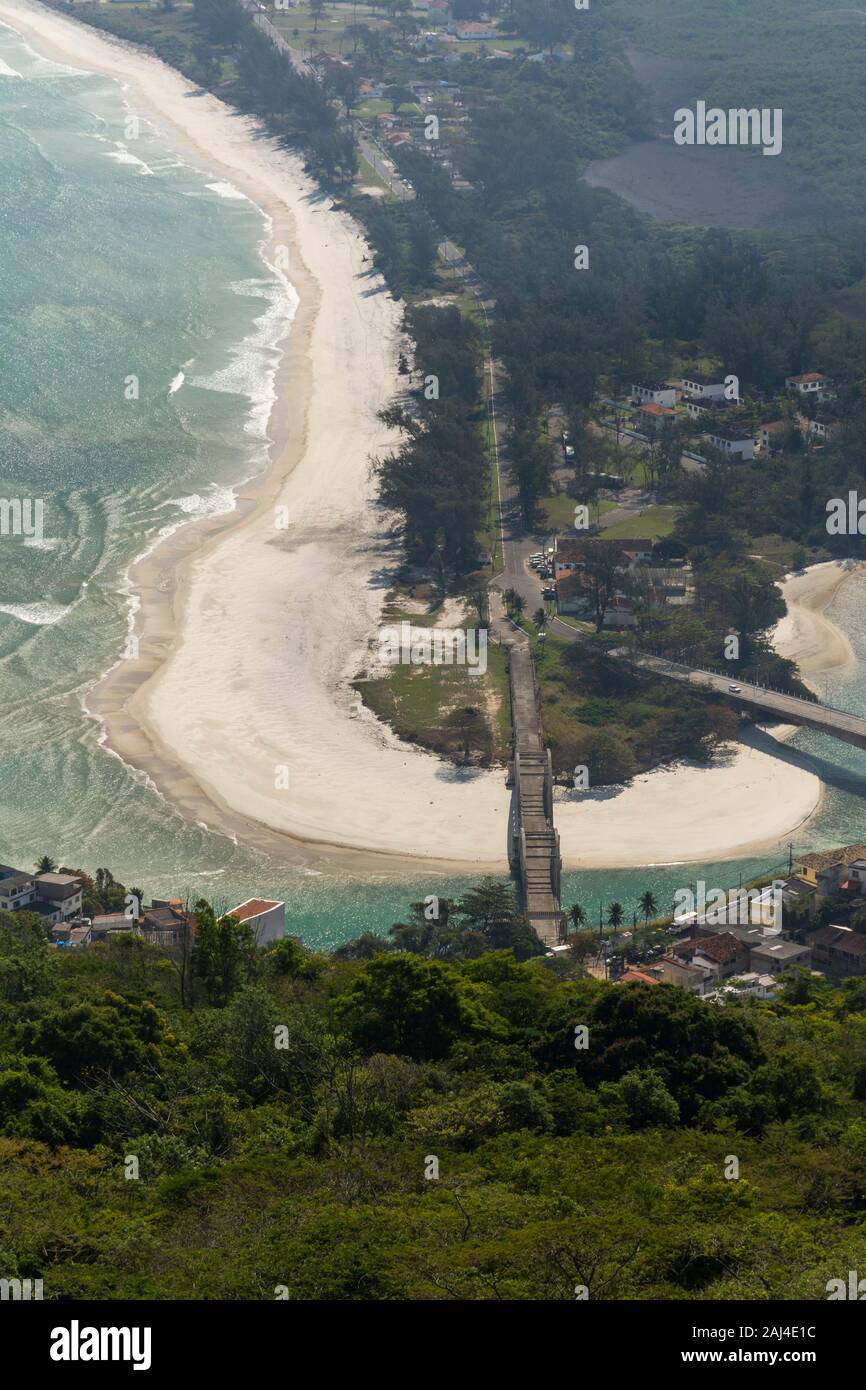 View from mountain top to river mouth, ocean and restinga vegetation ...