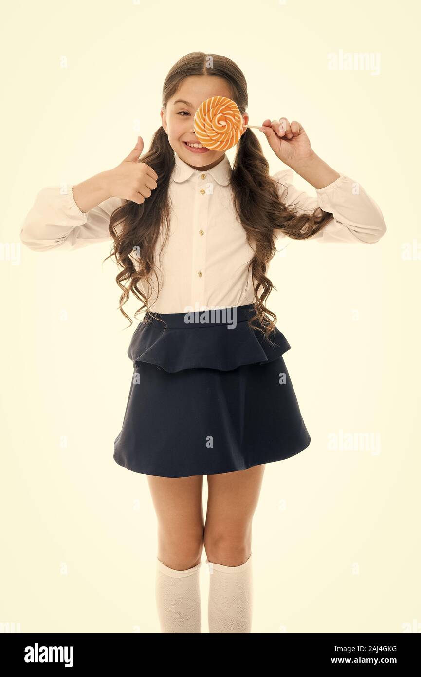 Healthy nutrition diet. Sweets reward for study. Rewarding herself with ...