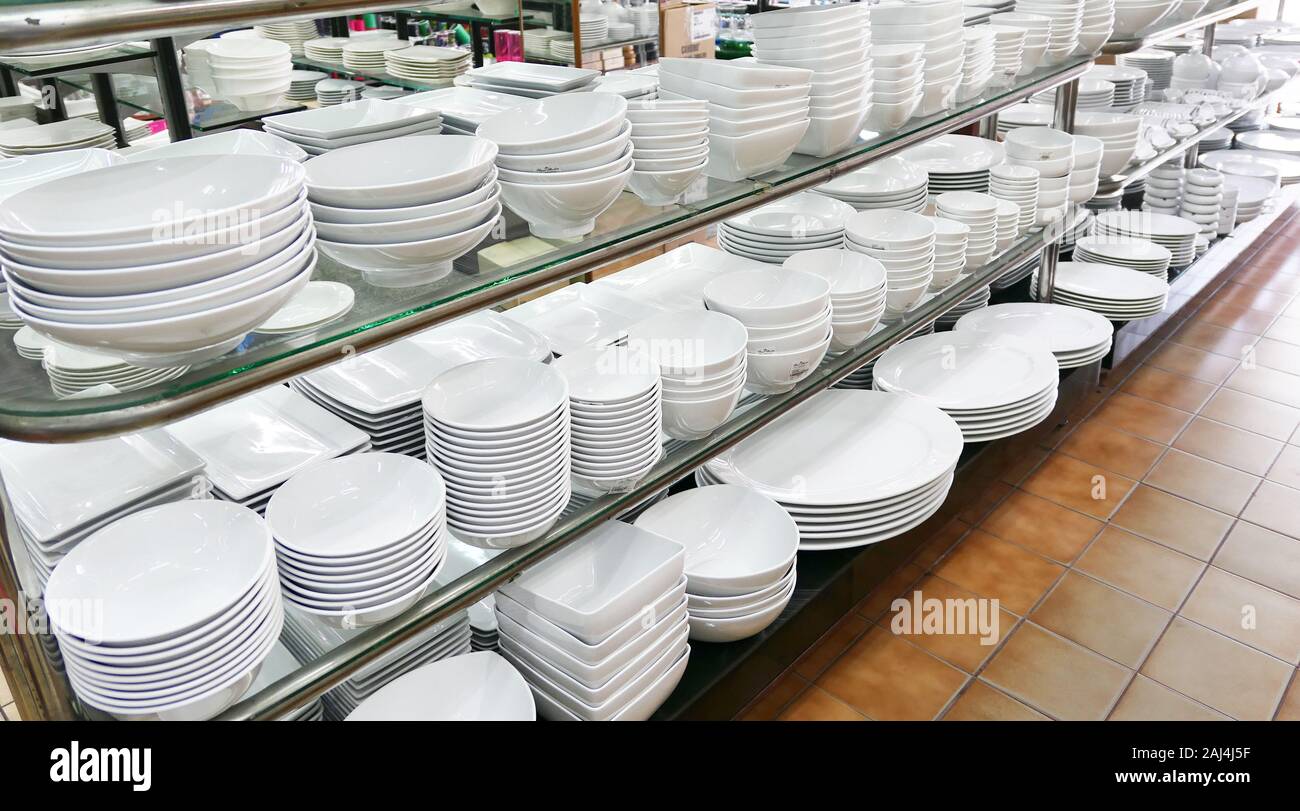 White plates in a shop Stock Photo - Alamy