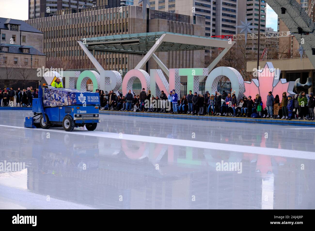 in movement Ice cleaning machine on skating rink in front of Iconic ...