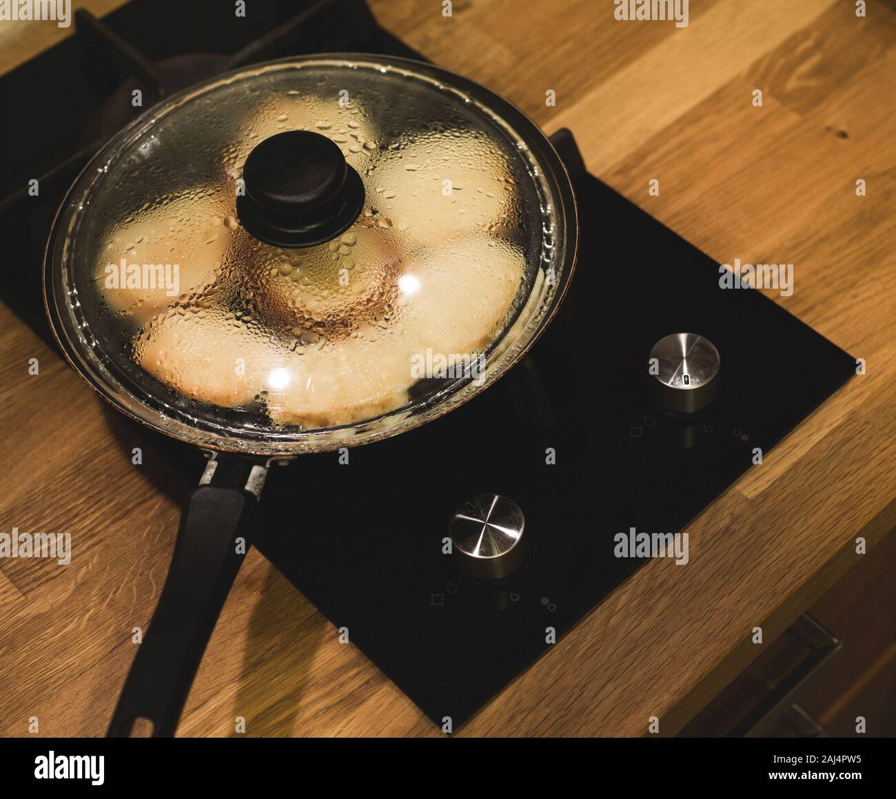 Frying pan on gas stove hi-res stock photography and images - Alamy