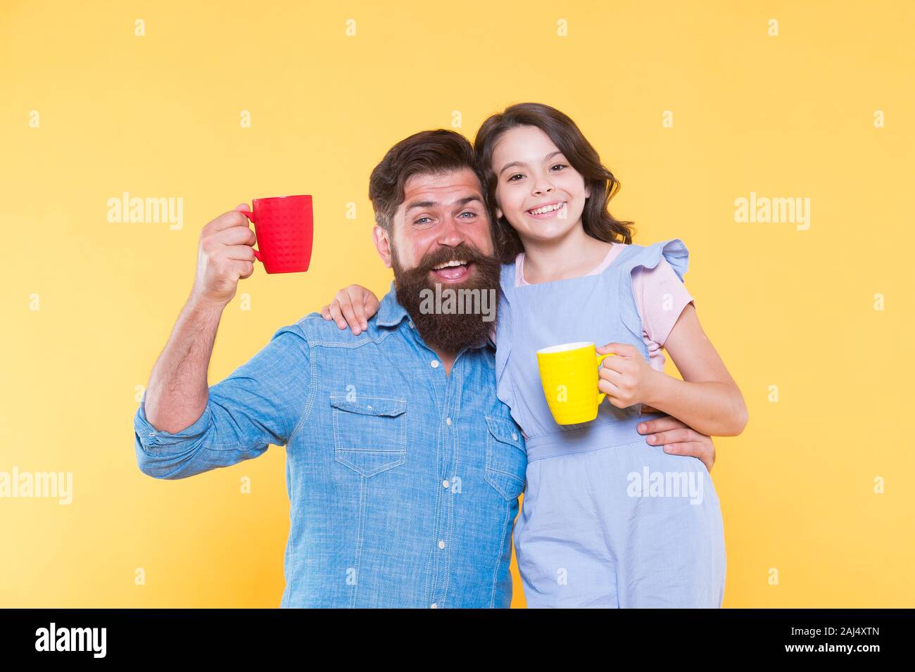 Drink healthy live well. Happy family drink milk tea. Little child and ...