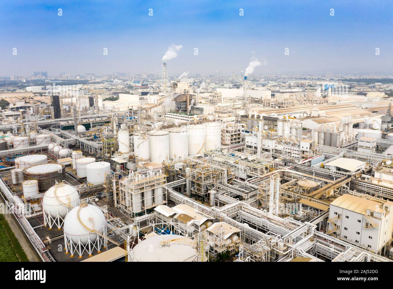 Aerial view of industrial area with chemical plant. Smoking chimney ...