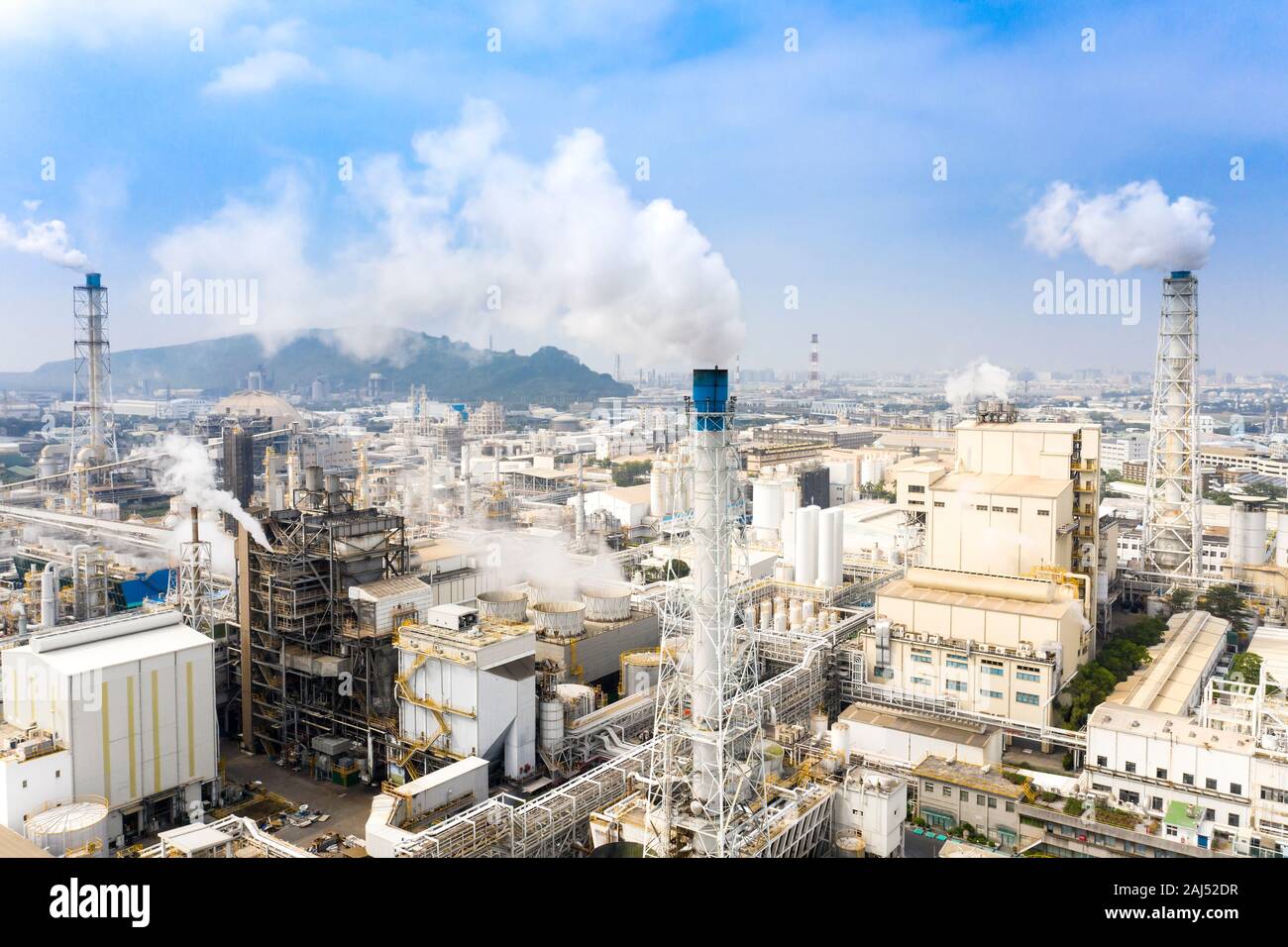 Aerial view of industrial area with chemical plant. Smoking chimney ...
