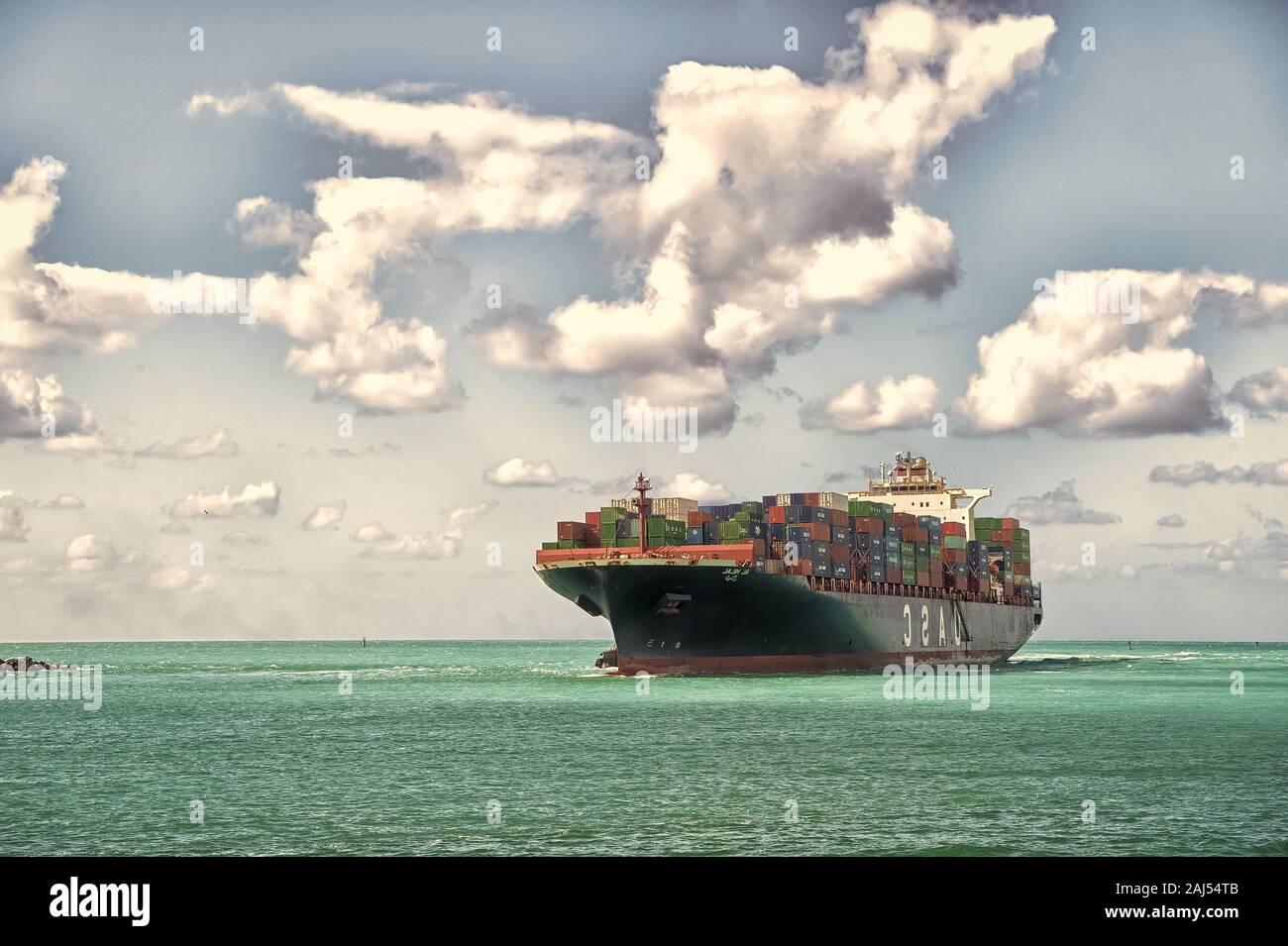 Sailing to Miami. Giant barge cargo containers Miami Florida ...