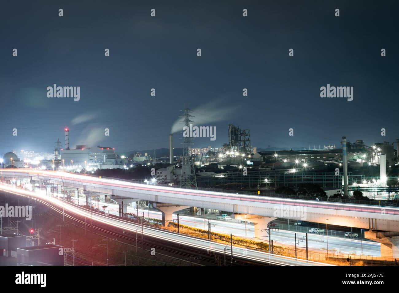 Night scape picture of industrial works and factory with big and tall ...