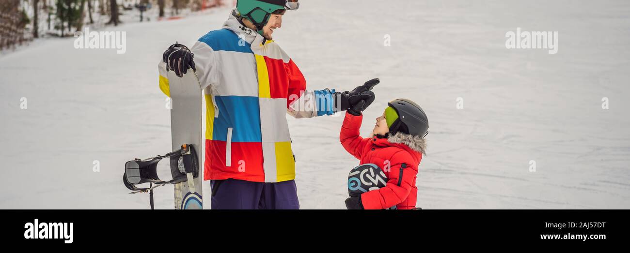 Snowboard instructor teaches a boy to snowboarding. Activities for ...