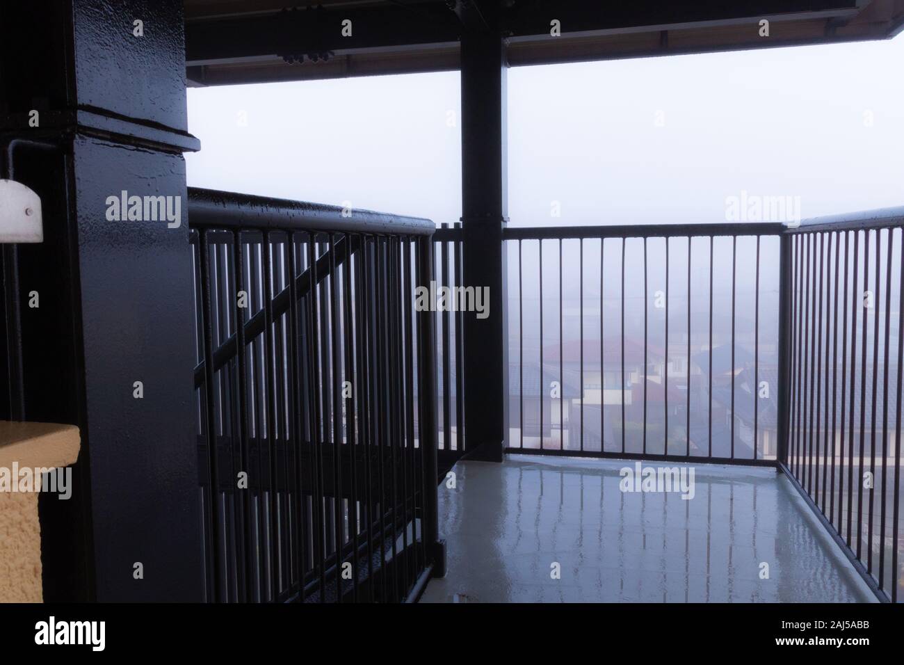 Stair railing in the cold morning with fog Stock Photo - Alamy