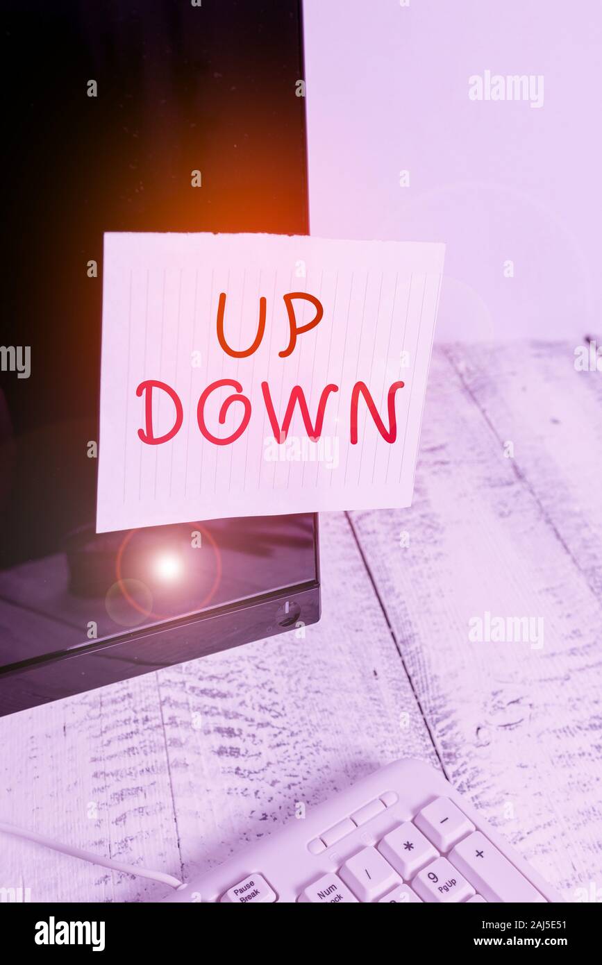 Text sign showing Up Down. Business photo text To look or to feel ...