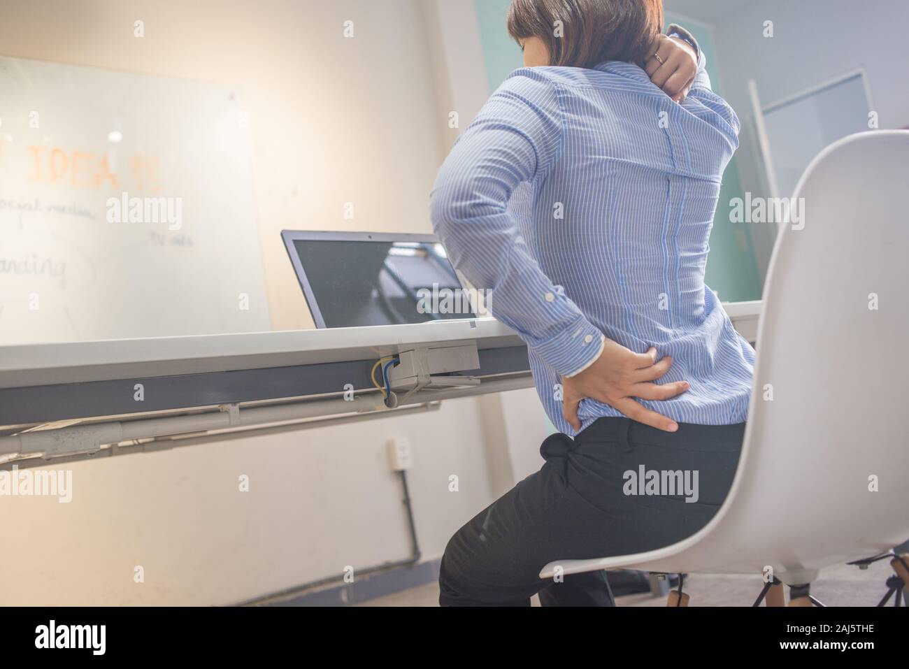 Backache office hi-res stock photography and images - Alamy