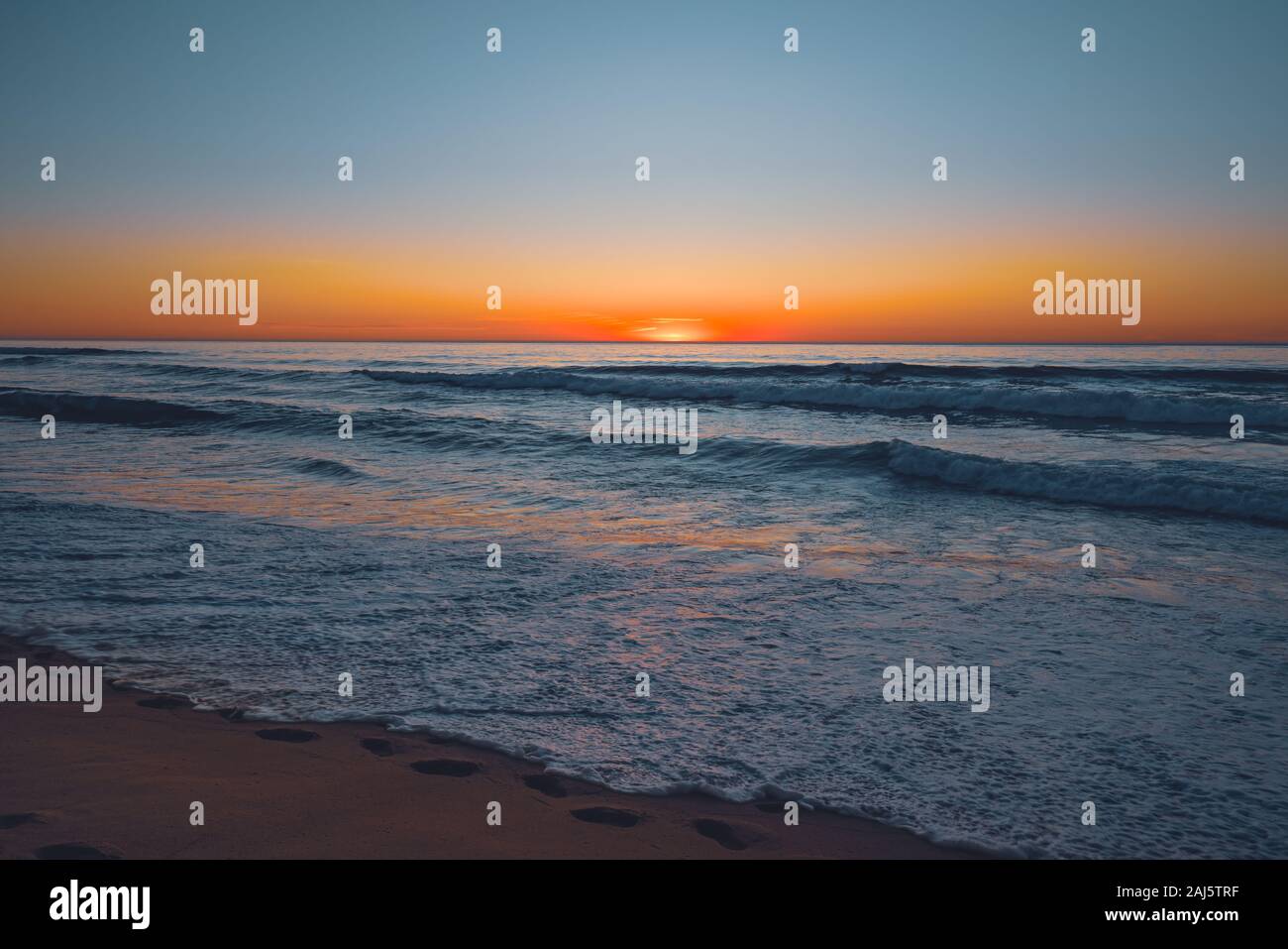 Abstract seascape. Beautiful tropical beach at sunset. Blue ocean ...