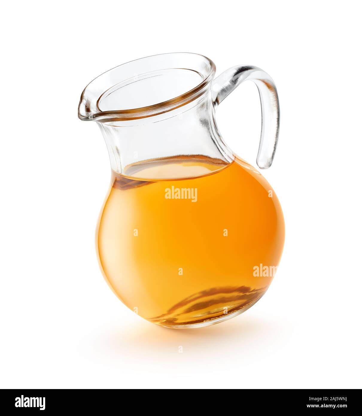 Apple juice in a pitcher isolated on white background Stock Photo - Alamy