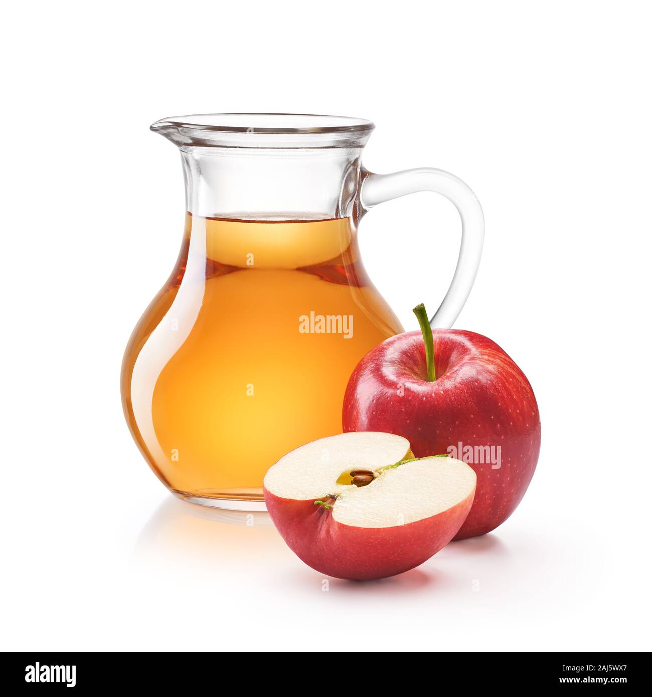 A jug of apple juice with red apples isolated on white background Stock ...
