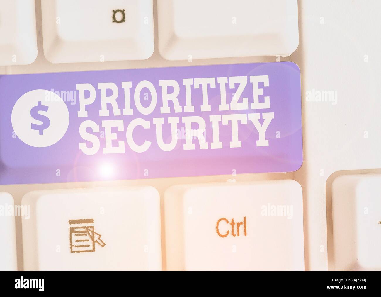 Writing note showing Prioritize Security. Business concept for ...