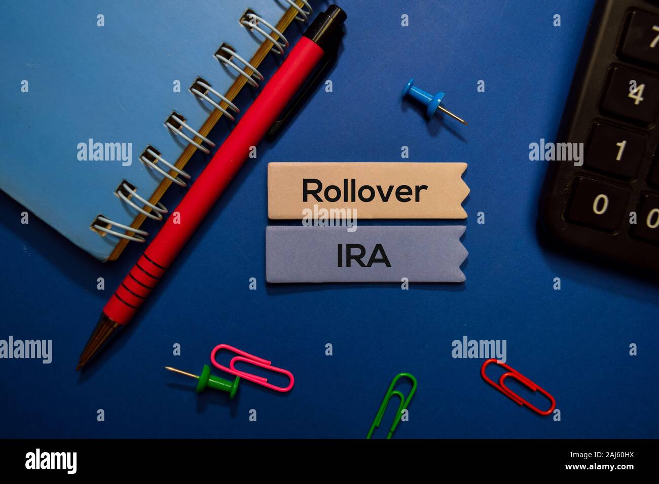 Roller IRA write on sticky note isolated on Office Desk Stock Photo - Alamy
