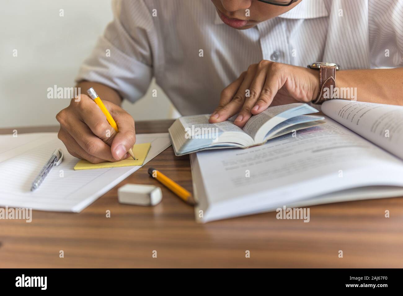 Kid student taking notes hi-res stock photography and images - Alamy