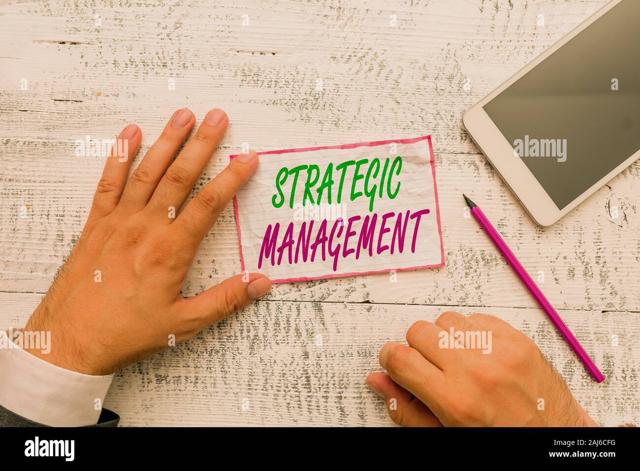 Conceptual hand writing showing Strategic Management. Concept meaning ...