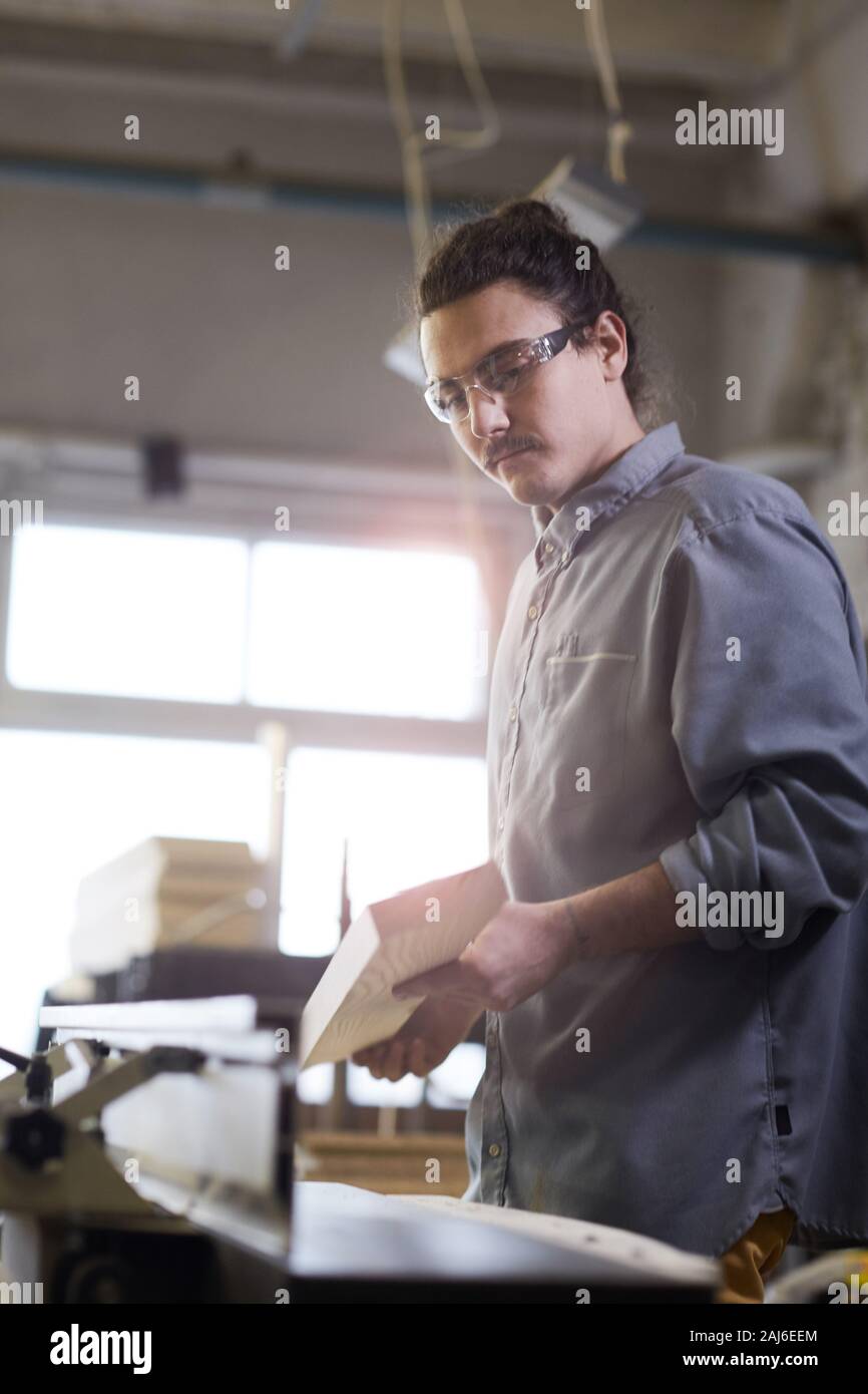 Man working on lathe hi-res stock photography and images - Alamy