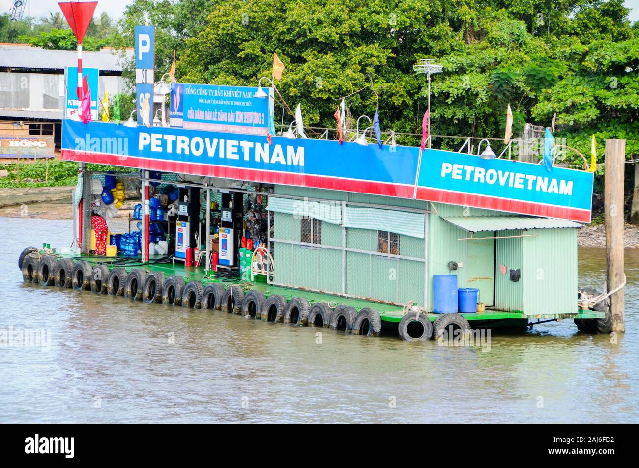 Mekong Delta, Vietnam; May 27 2011. Floating gas station providing fuel ...