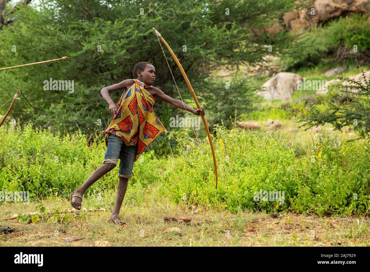 Hunters with bows and arrows of the Hadzabe indigenous ethnic group in ...