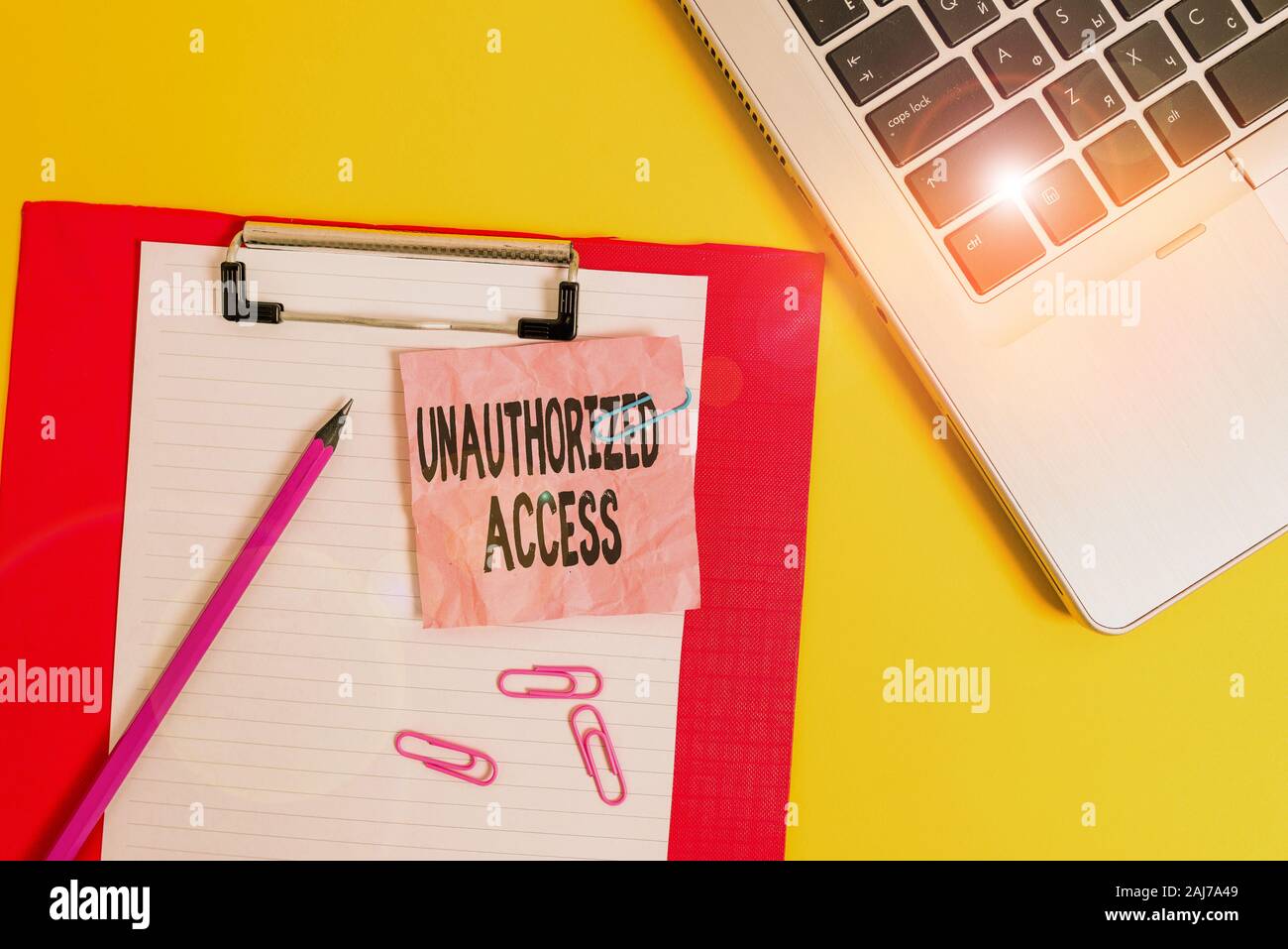 Writing note showing Unauthorized Access. Business concept for use of a ...