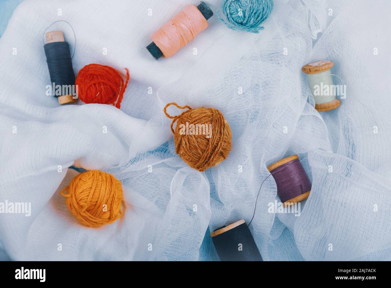 multi-colored threads for sewing and knitting Stock Photo - Alamy