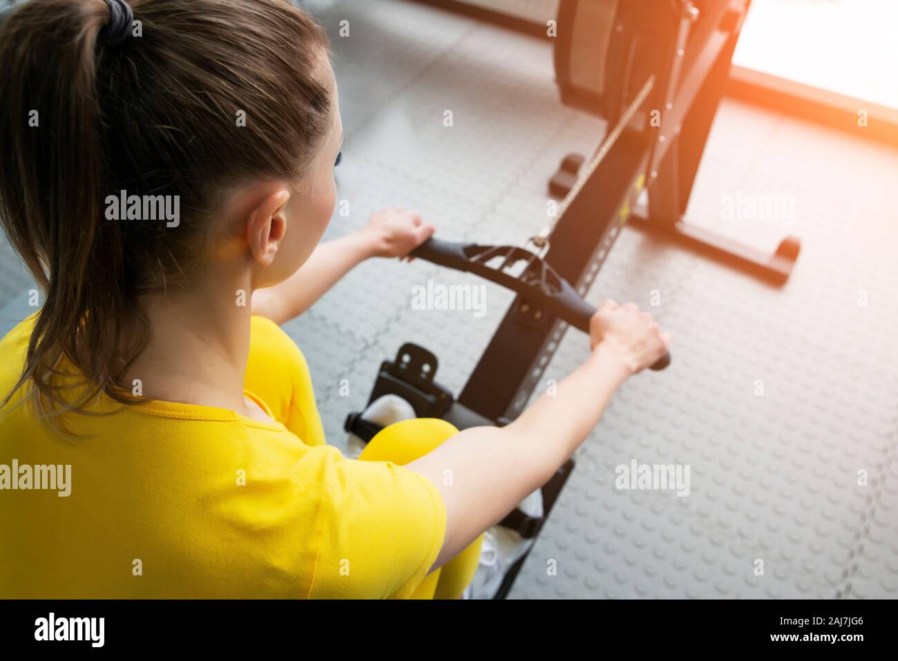 Female rowing machine gym hi-res stock photography and images - Alamy