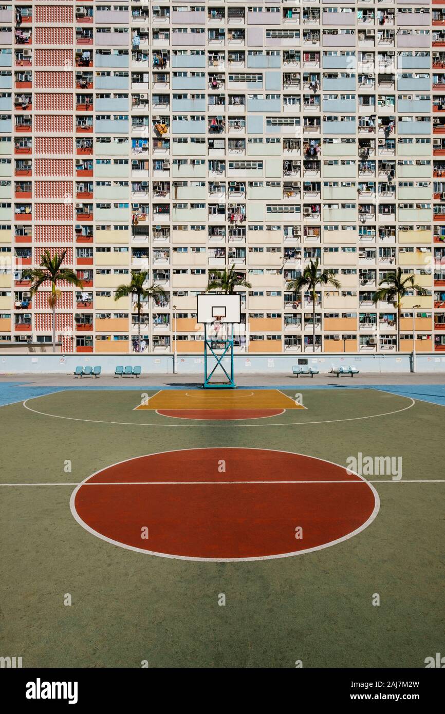 basketball court and rainbow colored building facade in HongKong Stock ...