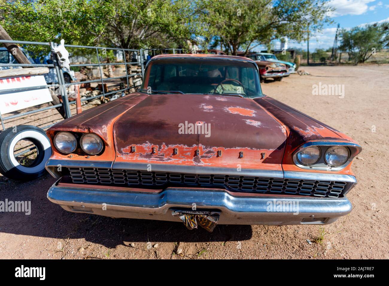 Old rusty red car abandoned Stock Photo - Alamy