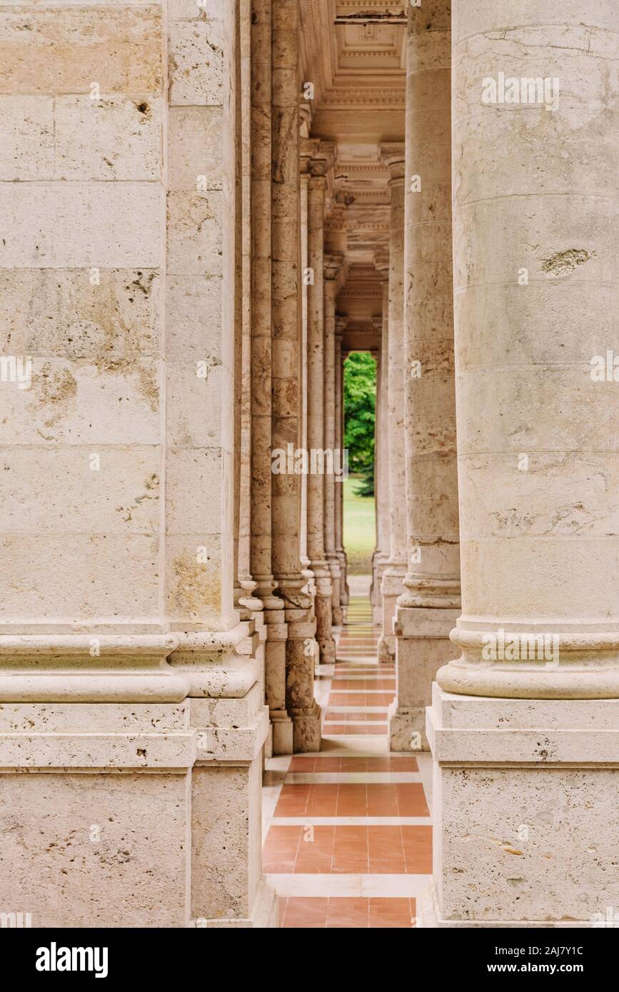 Arch corridor. Architecture for high columns. Narrow long passage among ...