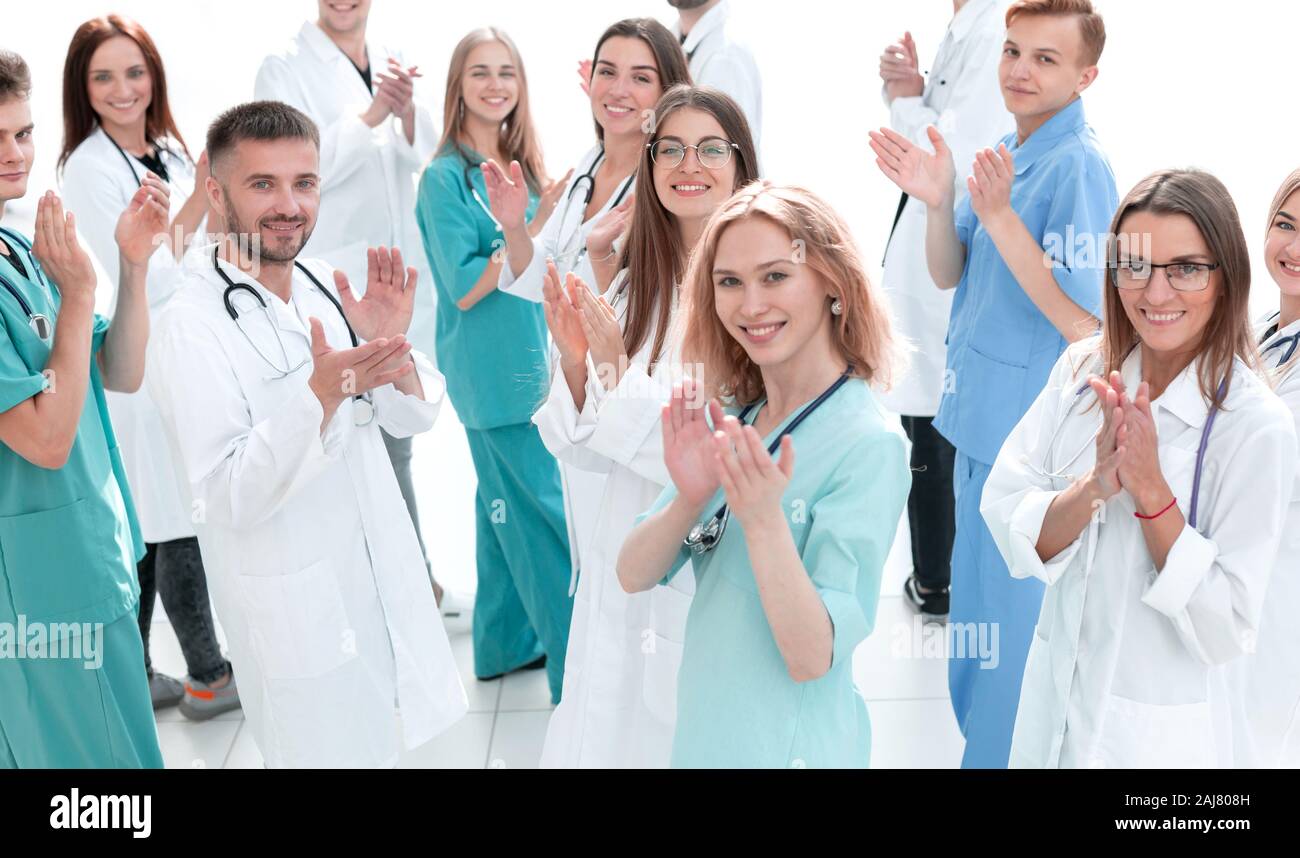 large group of doctors congratulating each other with applause Stock ...
