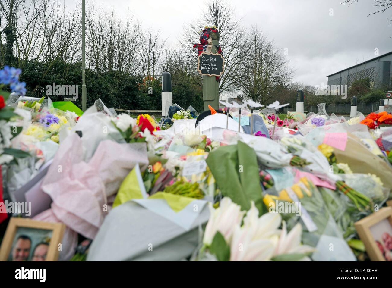 Floral tributes that have been left at the scene in Stanwell, near ...
