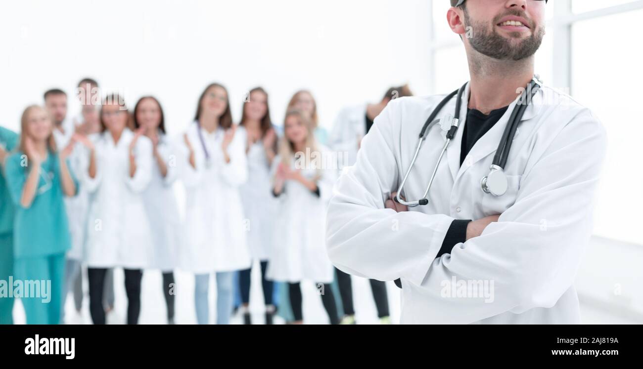 top view. a group of smiling doctors pointing at you Stock Photo - Alamy