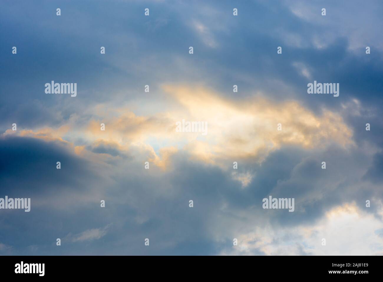 texture of a colorful sky with clouds and sun Stock Photo - Alamy