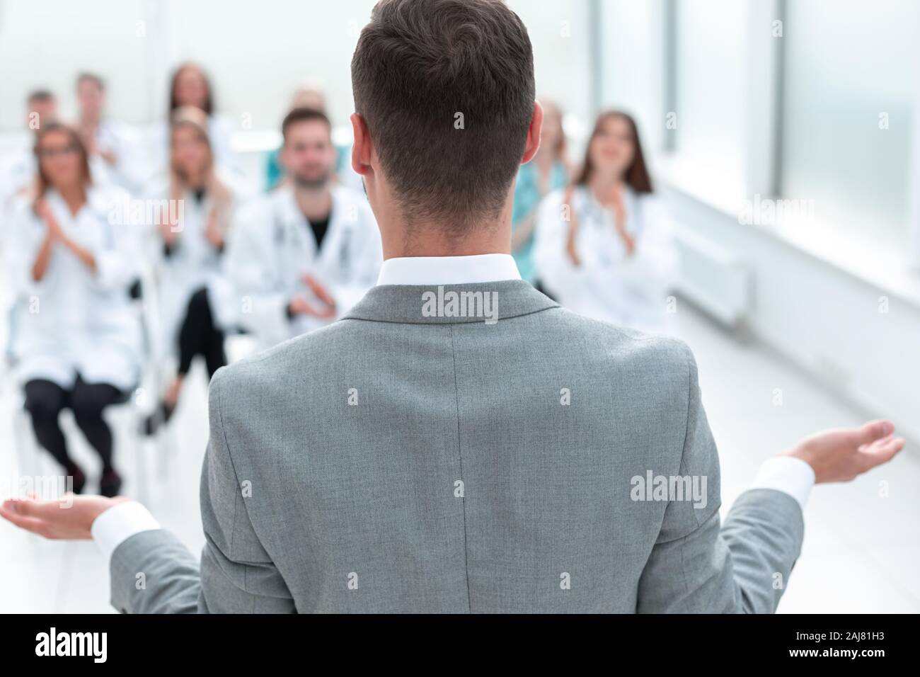 top view. a group of smiling doctors pointing at you Stock Photo - Alamy