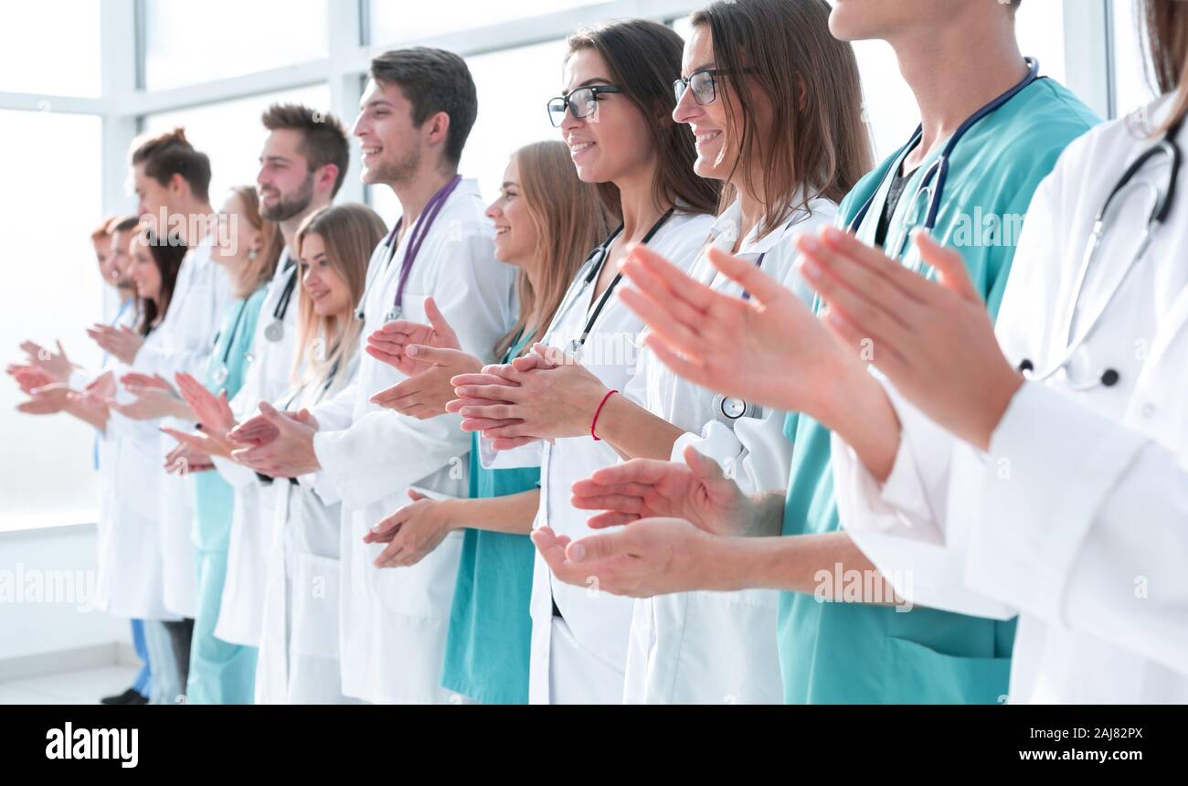 top view. a group of smiling doctors pointing at you Stock Photo - Alamy