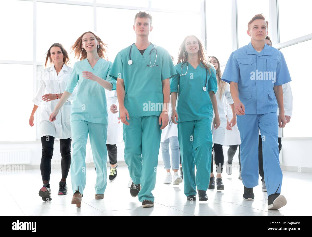 group of happy young medical professionals showing their success Stock ...