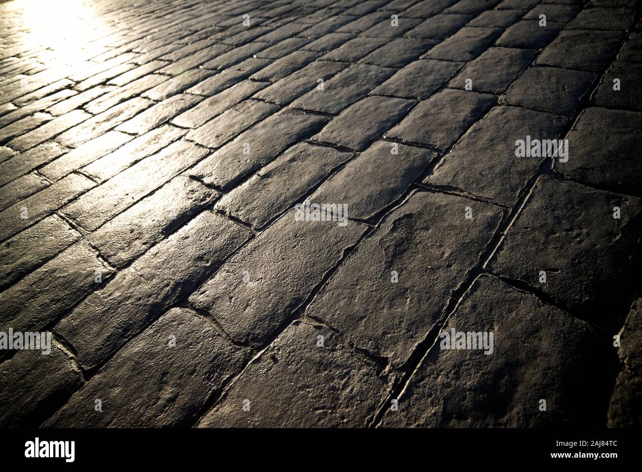 Floor of a street with stone tiles Stock Photo - Alamy