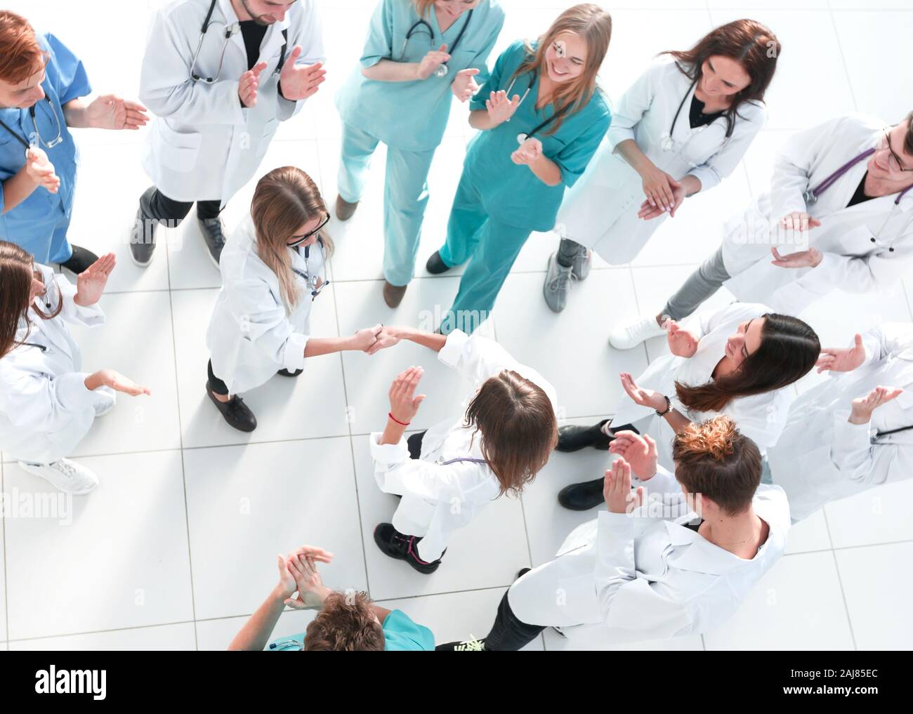 male doctor standing in front of a group of medical students Stock ...