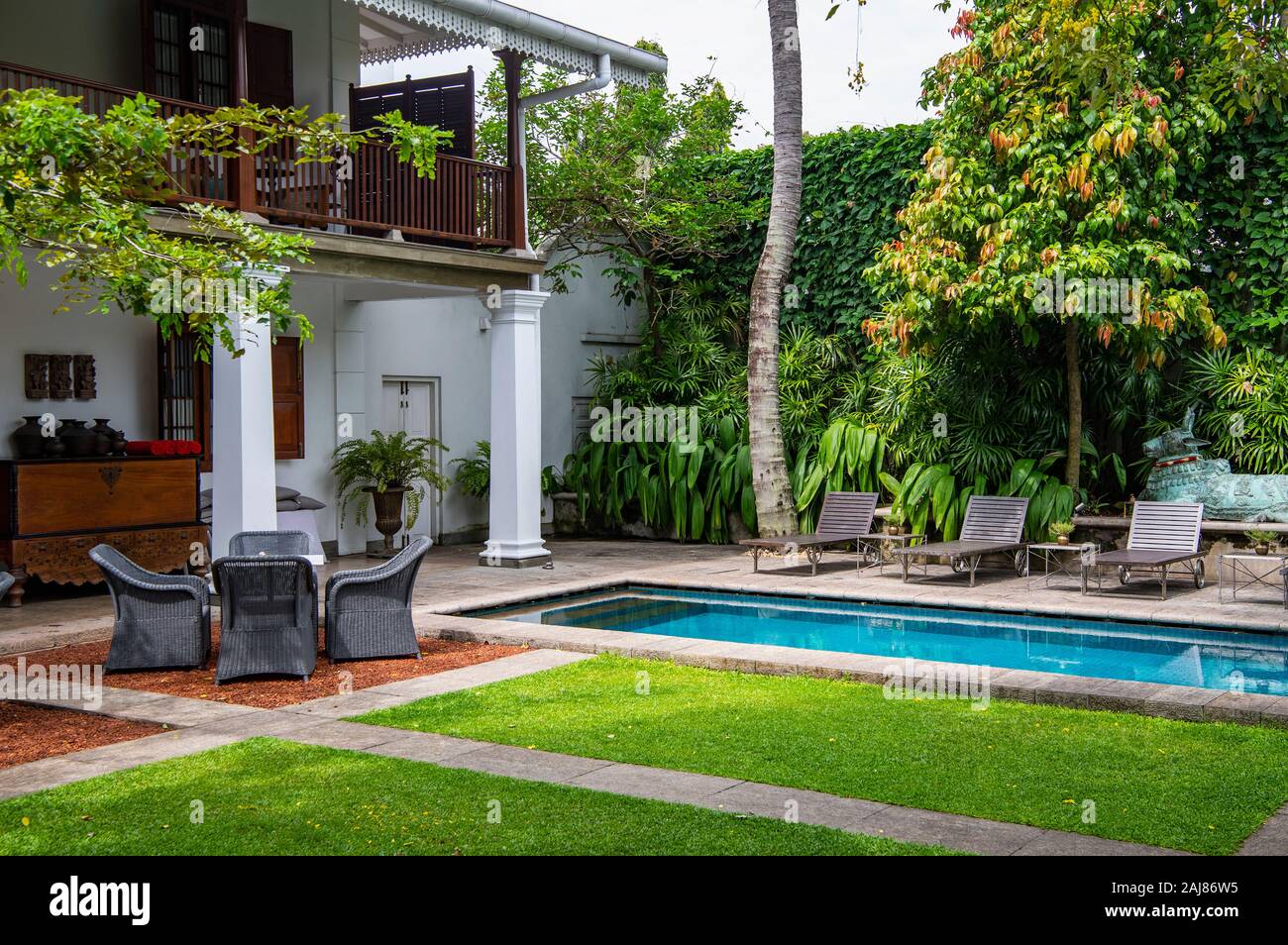 swimming pool in the court yard of a colonial style boutique hotel ...