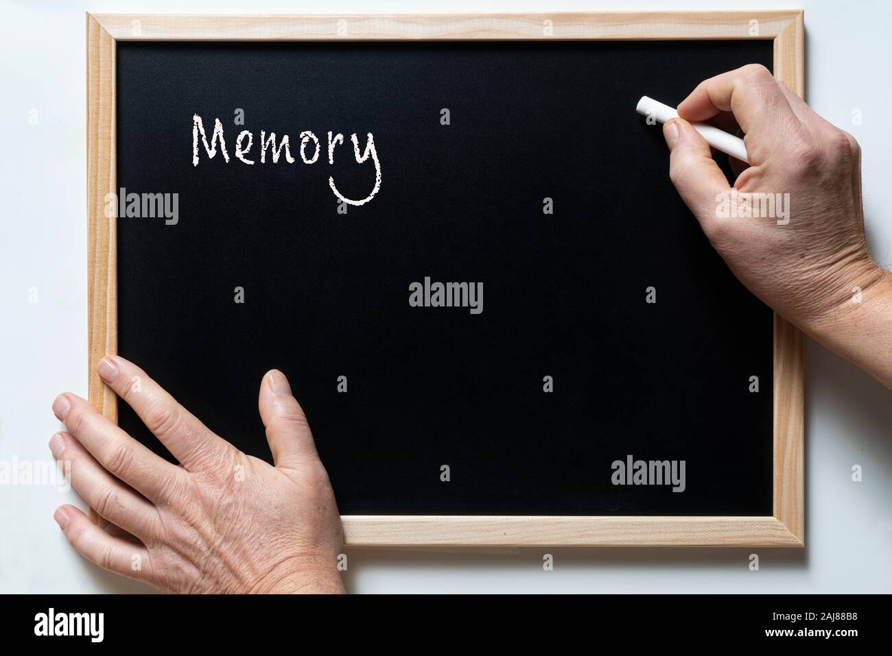 a blackboard with written the word memory Stock Photo - Alamy