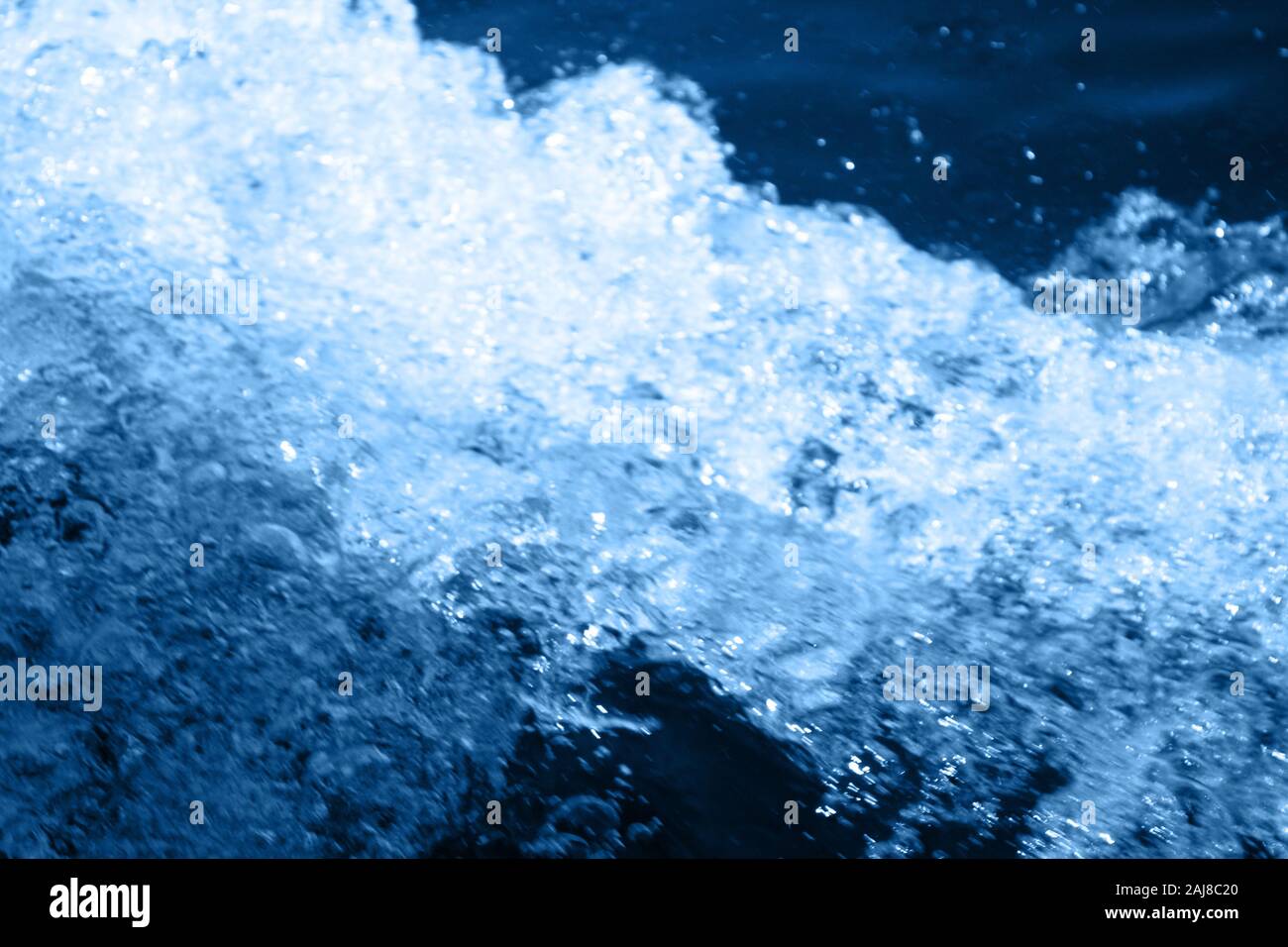 Classic blue 2020. Gradient color palette. Splashing waves on the water ...