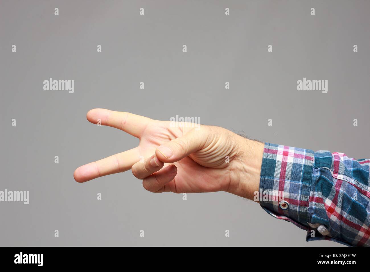 Hand of an adult person making signs and signals, showing numbers ...
