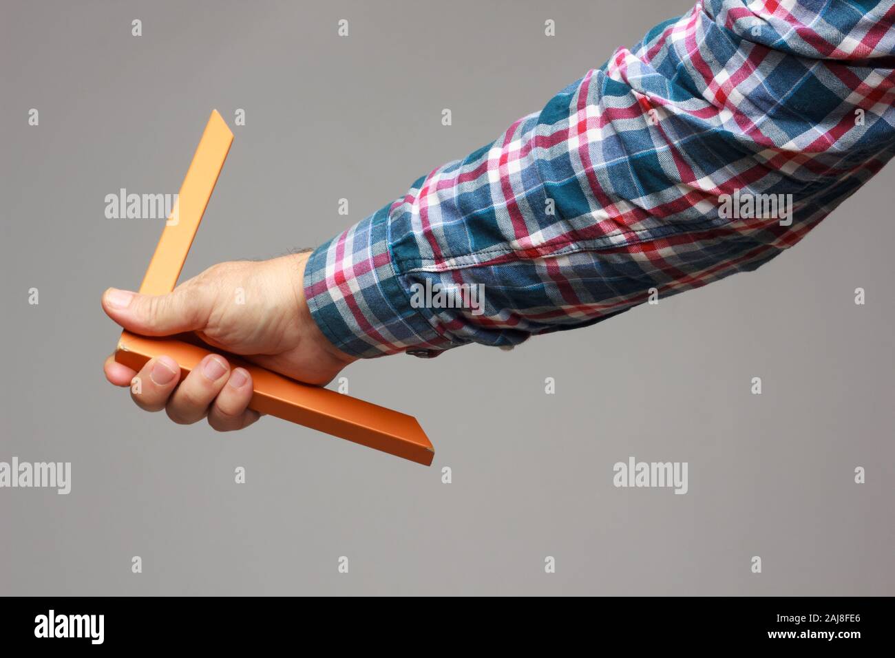 Hand ruler paper triangle hi-res stock photography and images - Alamy