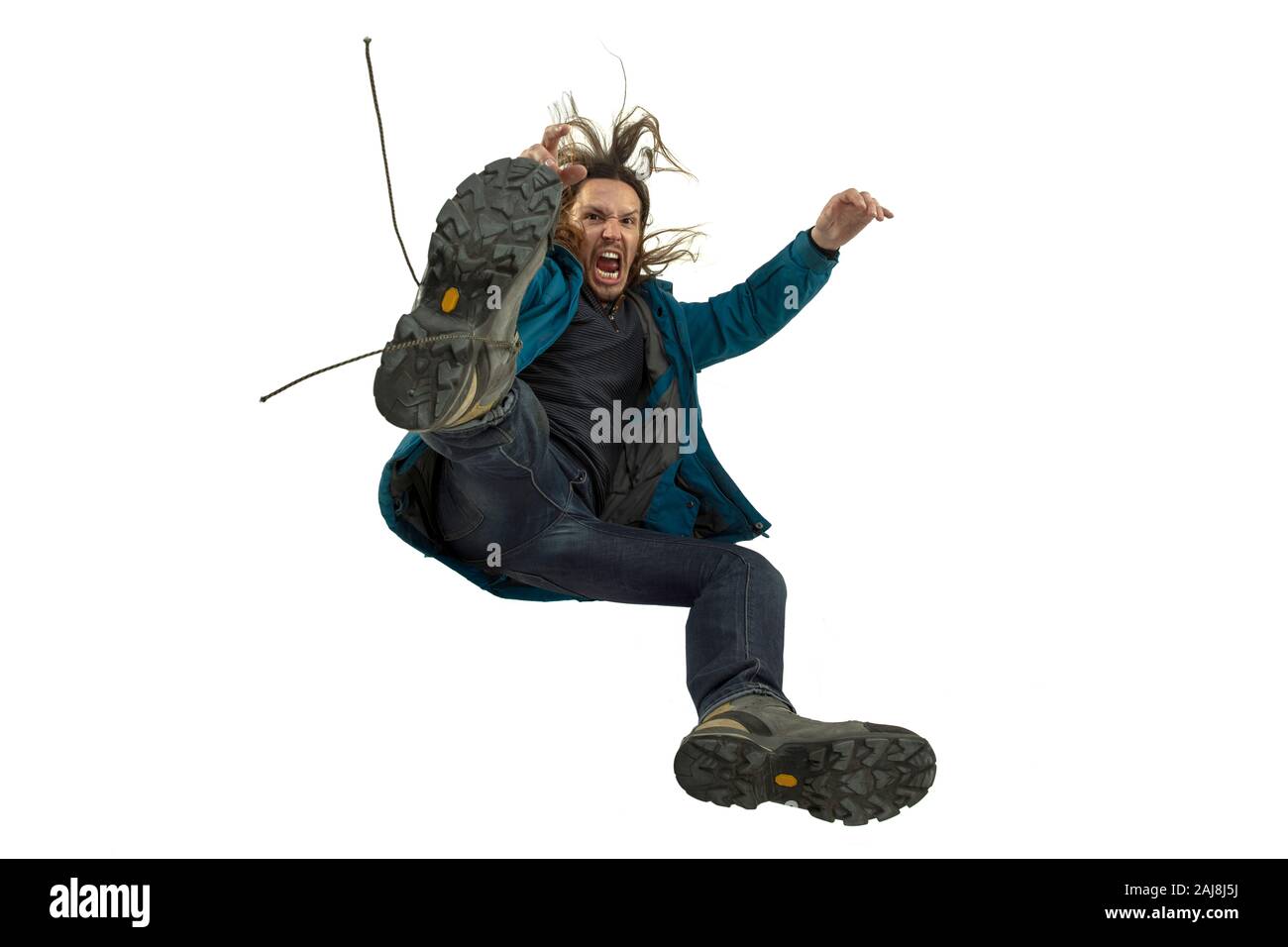 A second before falling. Caucasian young man falling down in moment ...