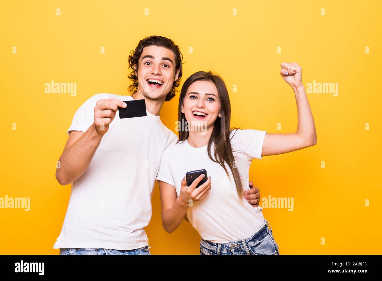 Image of loser man and winning woman playing together and competing in ...